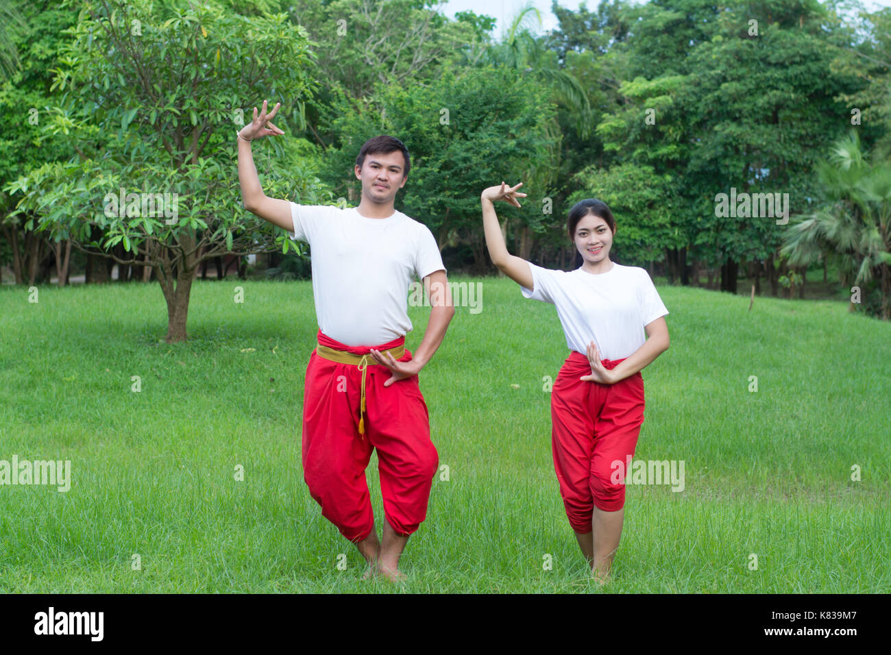Asian young boy and girls learning Thai dance. Classical Dance in white ...