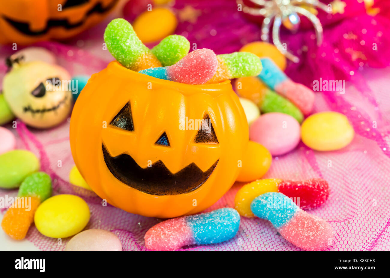 Halloween pumpkin, trick or treat with sweet candy Stock Photo - Alamy
