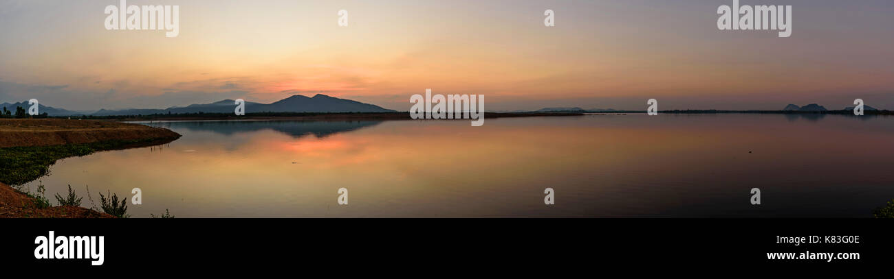 Panorama view of sunset at the lake Stock Photo - Alamy