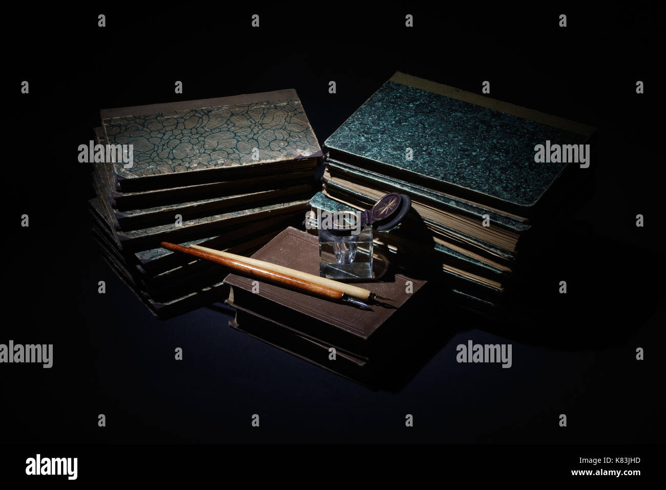 old books, papers, ink pen and inkpot on black background Stock Photo ...