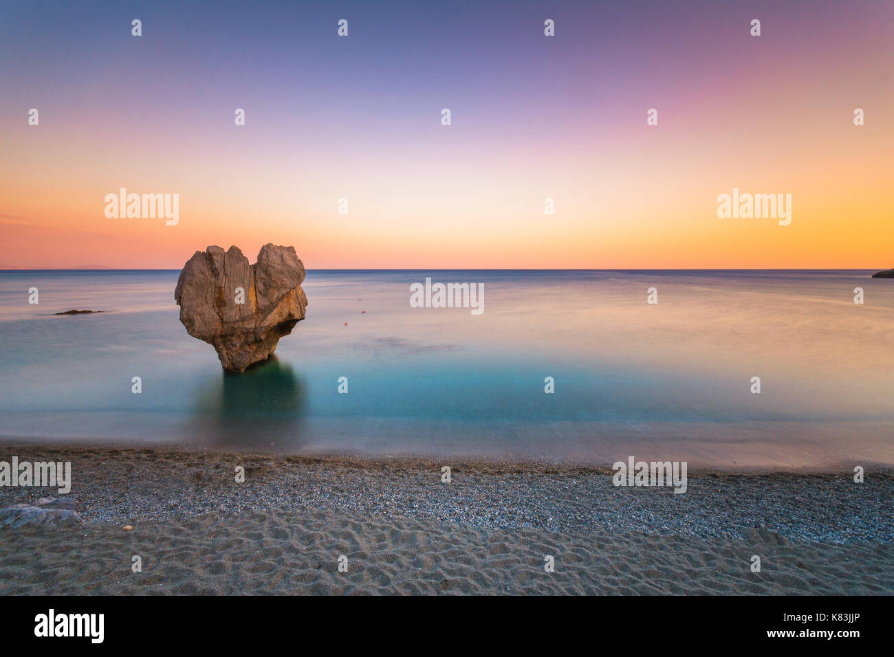 Lonely rock sculpture at the shape of heart, Preveli, Crete, Greece ...