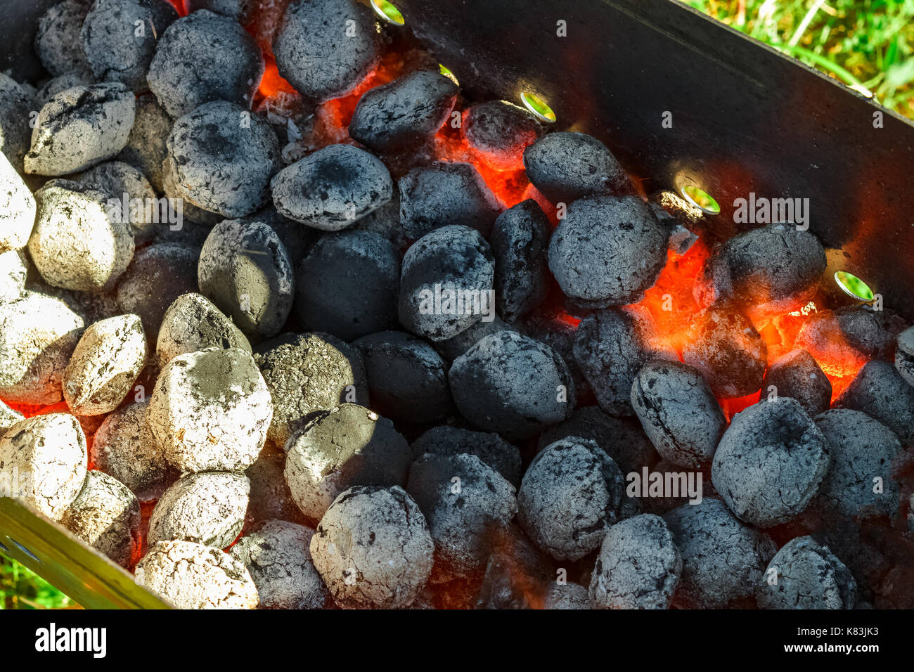 Hot flamed barbecue coal in a grill at summer party Stock Photo - Alamy