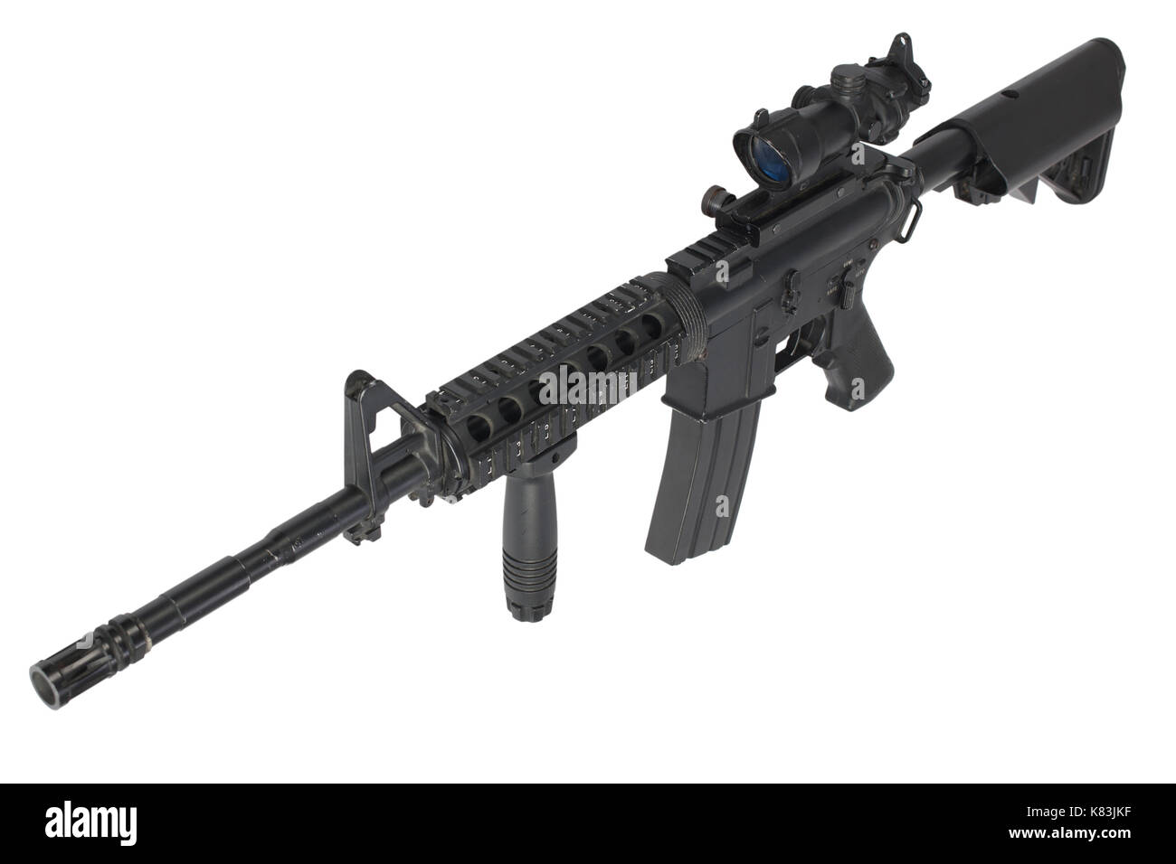 M4 Carbine with ACOG optic and a foregrip isolated on a white ...