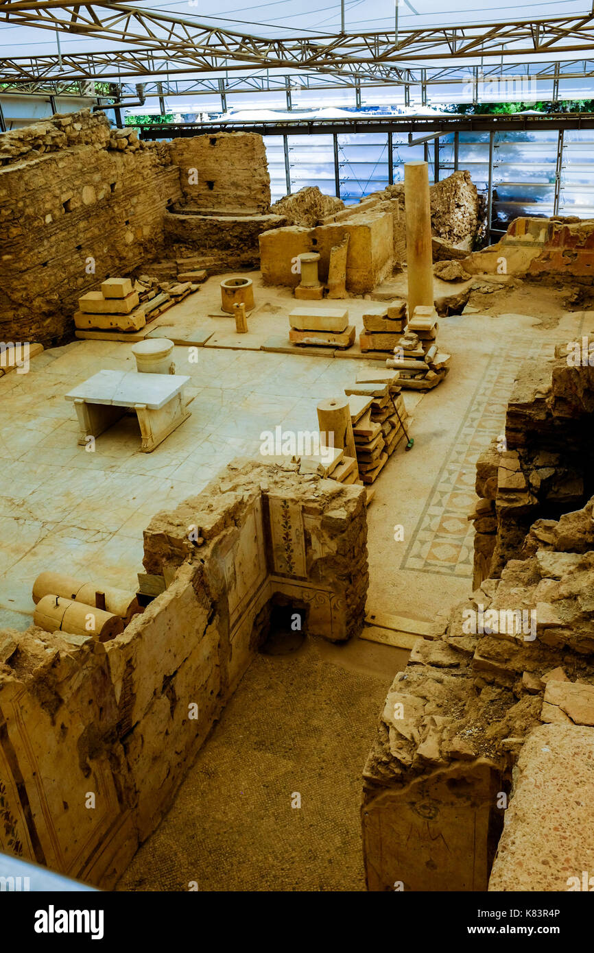 People tour inside the "Terrace Houses" in Ephesus, Turkey as workers ...