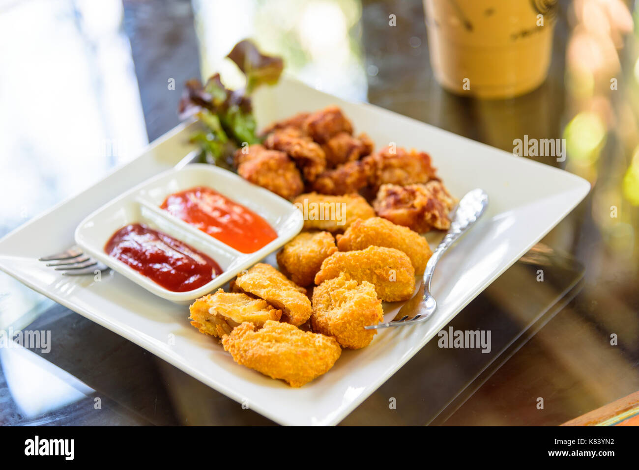 Chicken Karake in the disk with sauce Stock Photo - Alamy