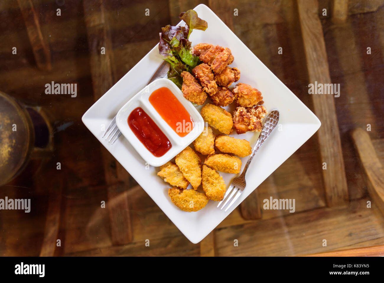 Chicken Karake in the disk with sauce Stock Photo - Alamy