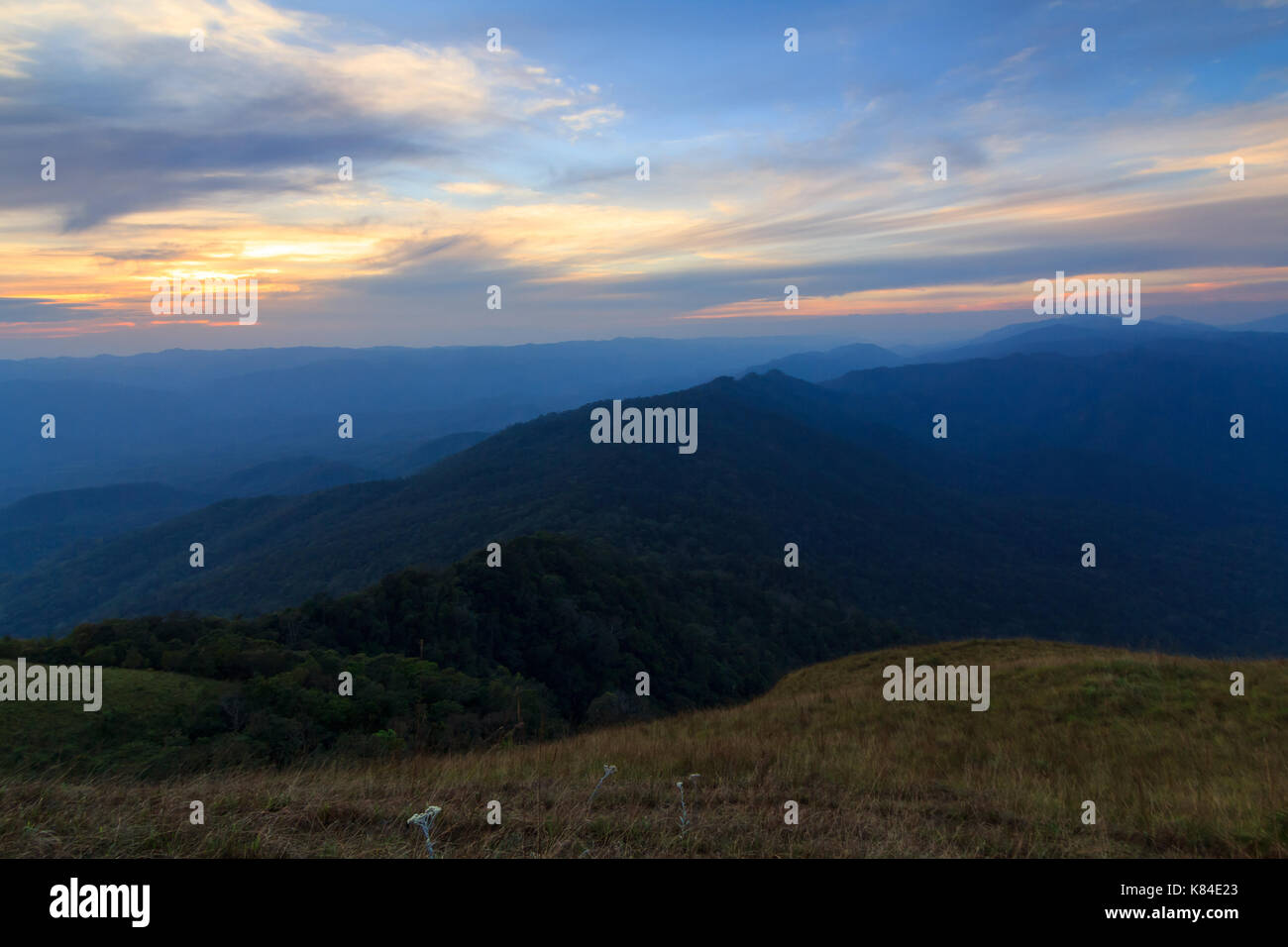 Sunset at the mountain Stock Photo - Alamy