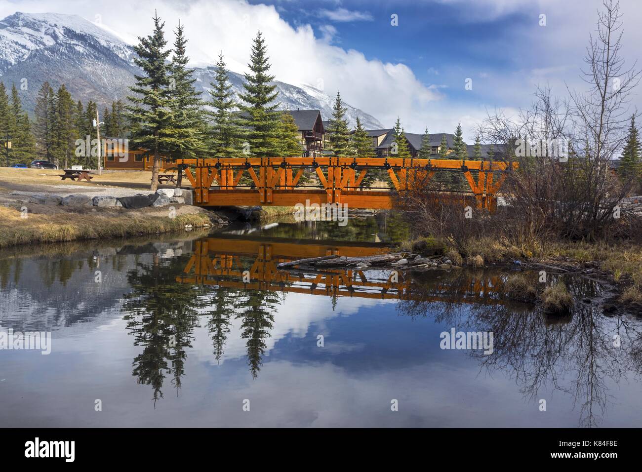 Wood Bridge over Spring Creek in Canmore Alberta Canada with ...