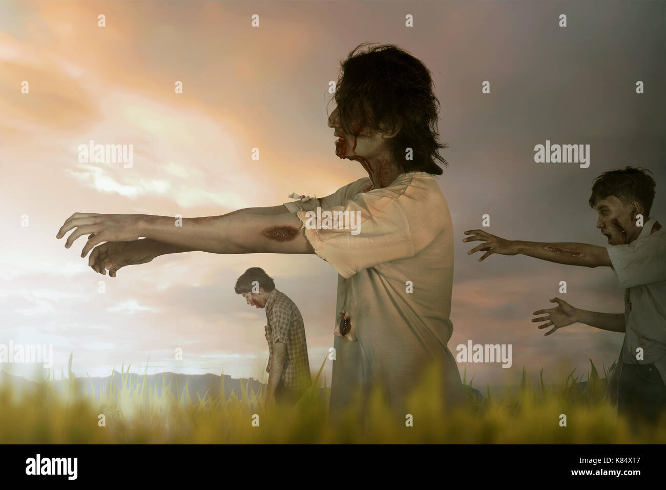 Crowd of asian zombies with blood and wounded face walking against ...
