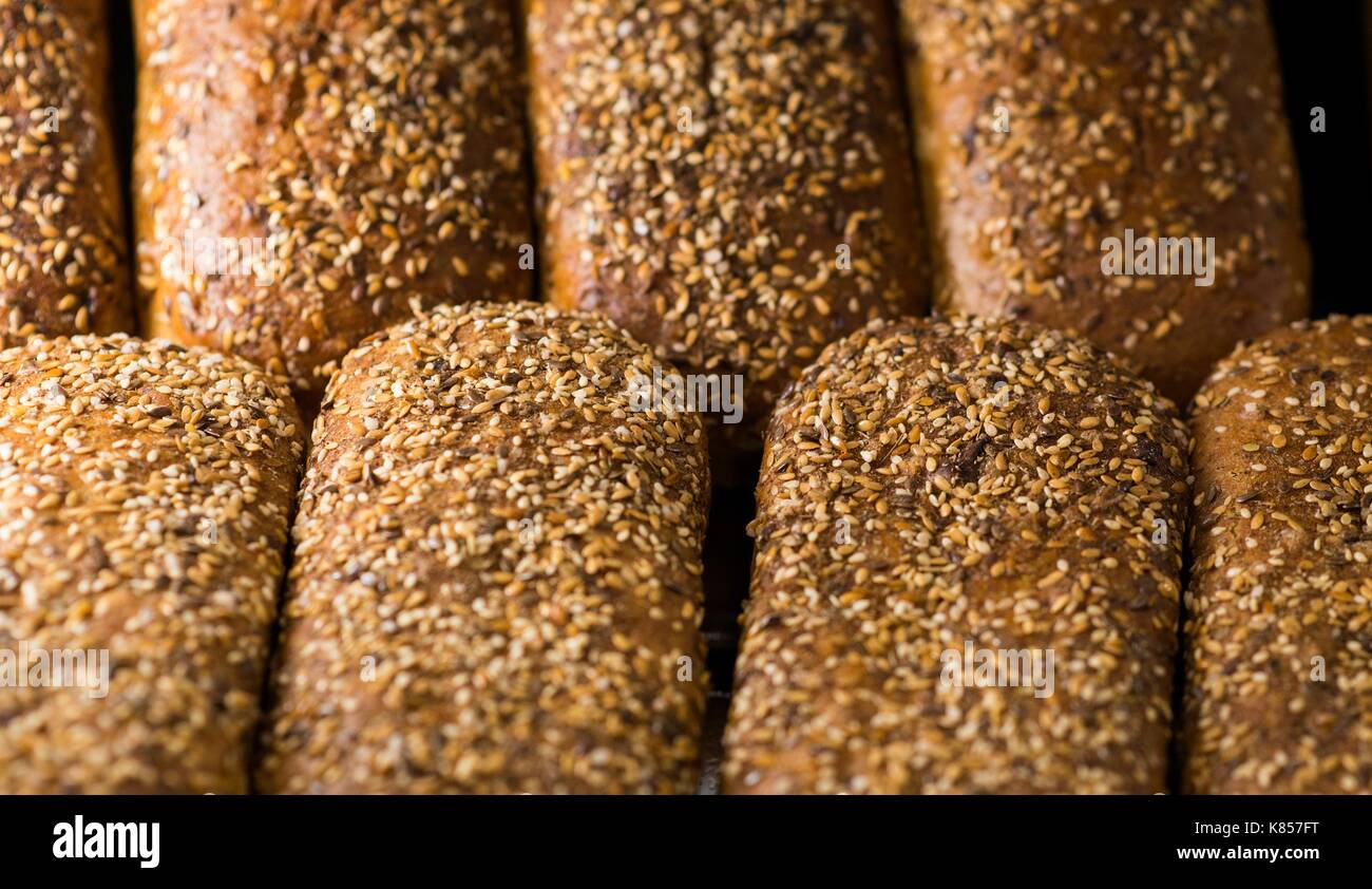 Freshly hot baked bread on bakery shelf Stock Photo - Alamy