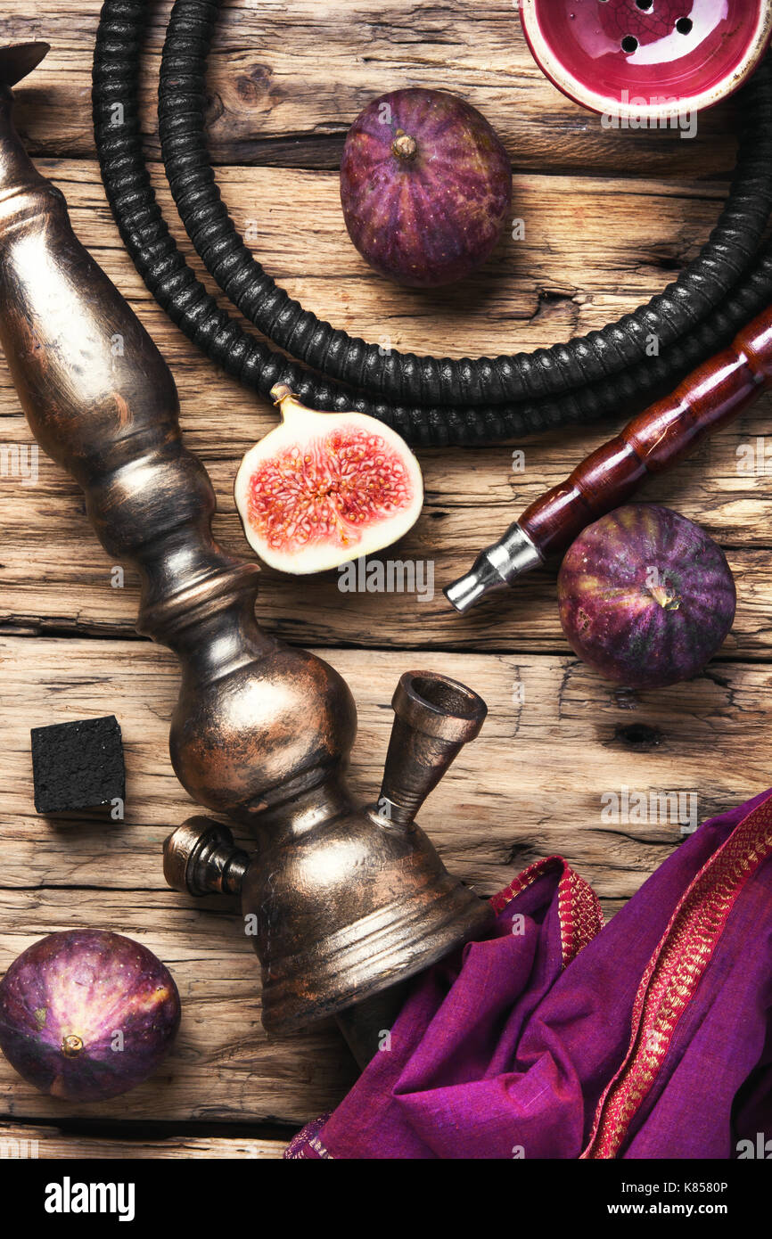 Exotic smoked shisha with tobacco with a taste of fig fruit Stock Photo ...