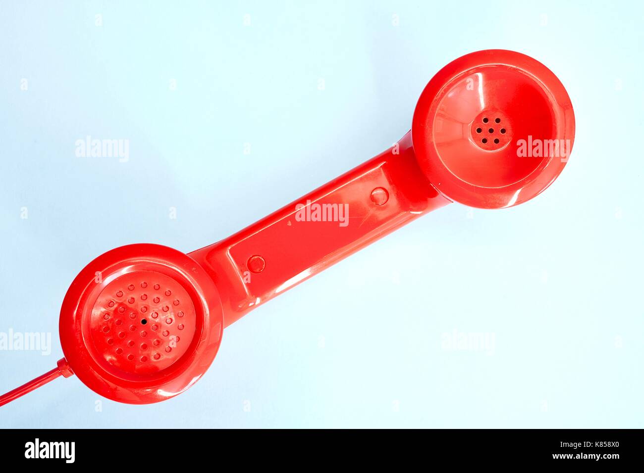 A studio photo of a red rotary telephone Stock Photo - Alamy