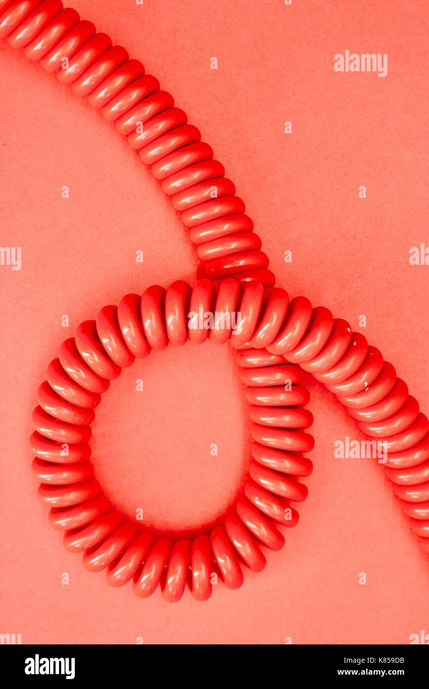 A studio photo of a red rotary telephone Stock Photo - Alamy
