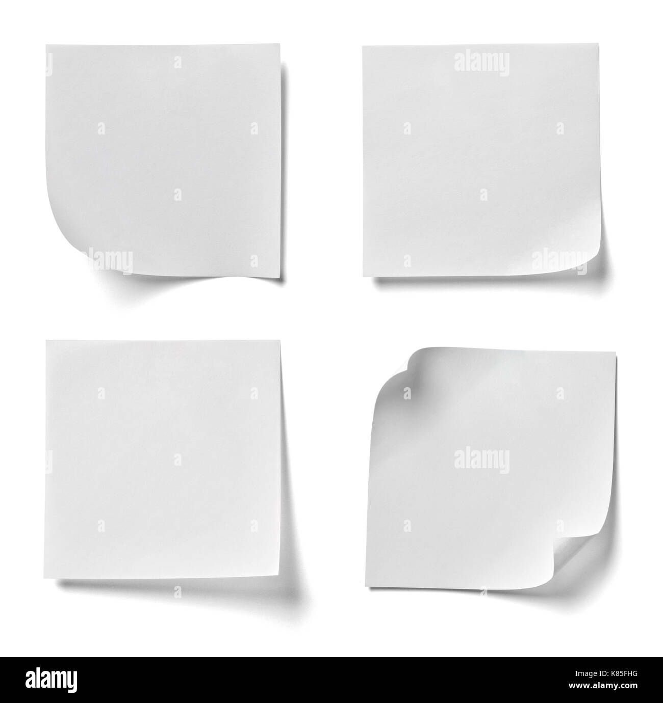collection of various note paper on white background. each one is shot ...