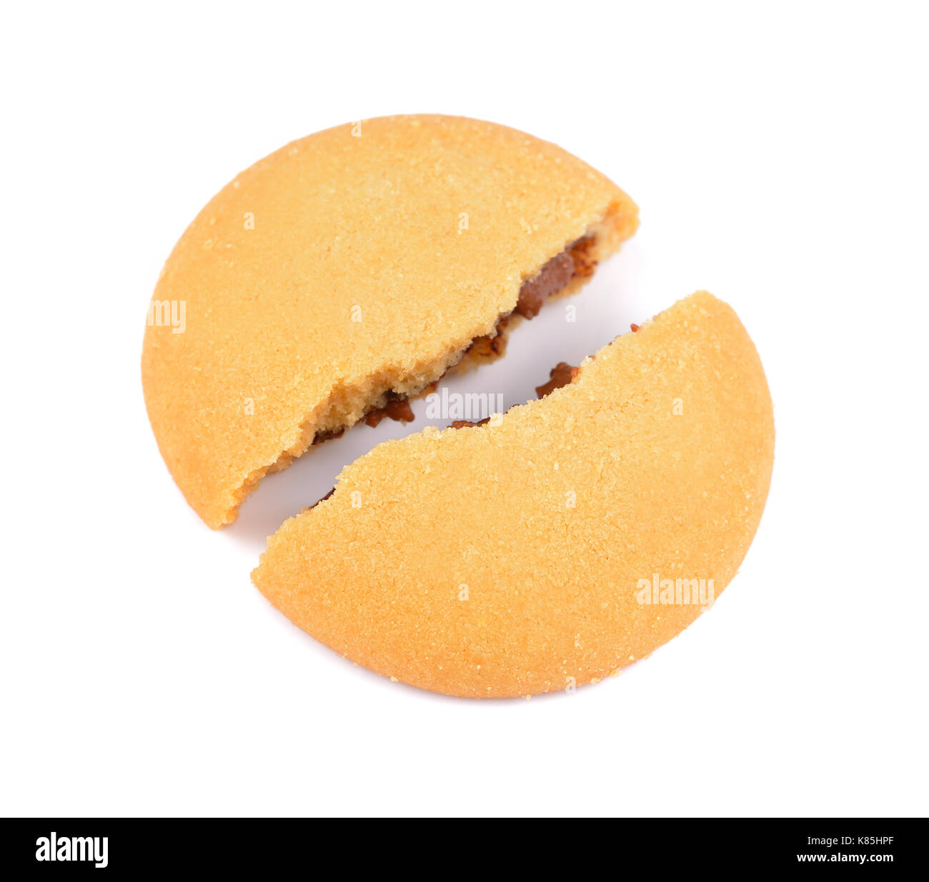 Broken into pieces round cookie isolated over the white background ...