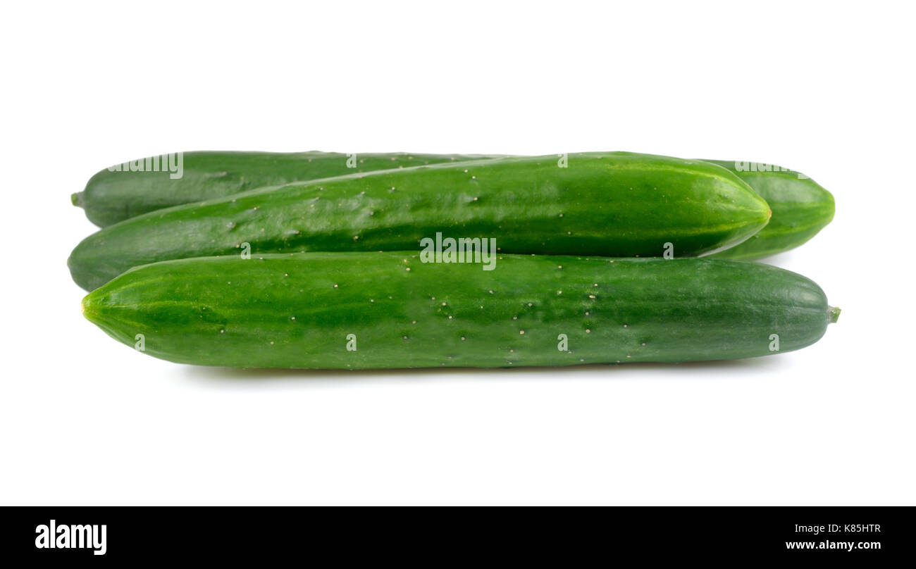 a group cucumbers isolated on white background Stock Photo - Alamy