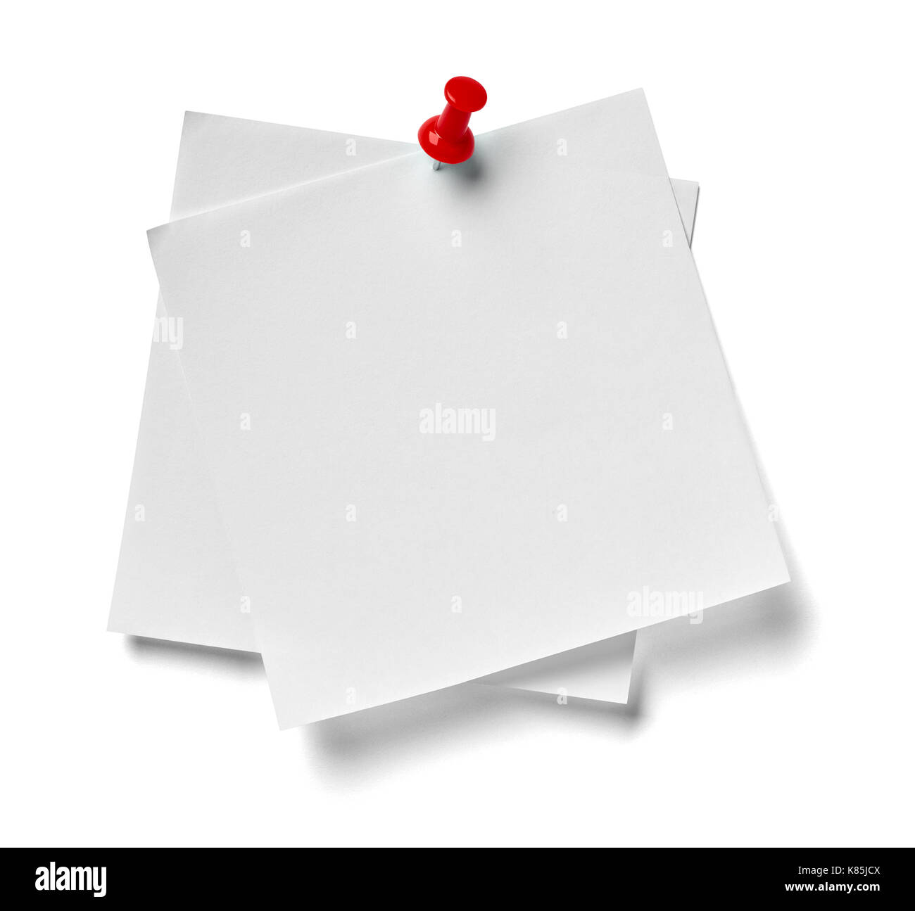 close up of a note paper with a red push pin on white background Stock ...