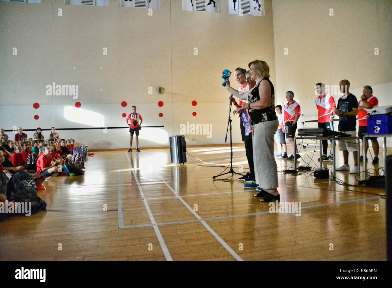 Queens relay baton school assembly hi-res stock photography and images ...