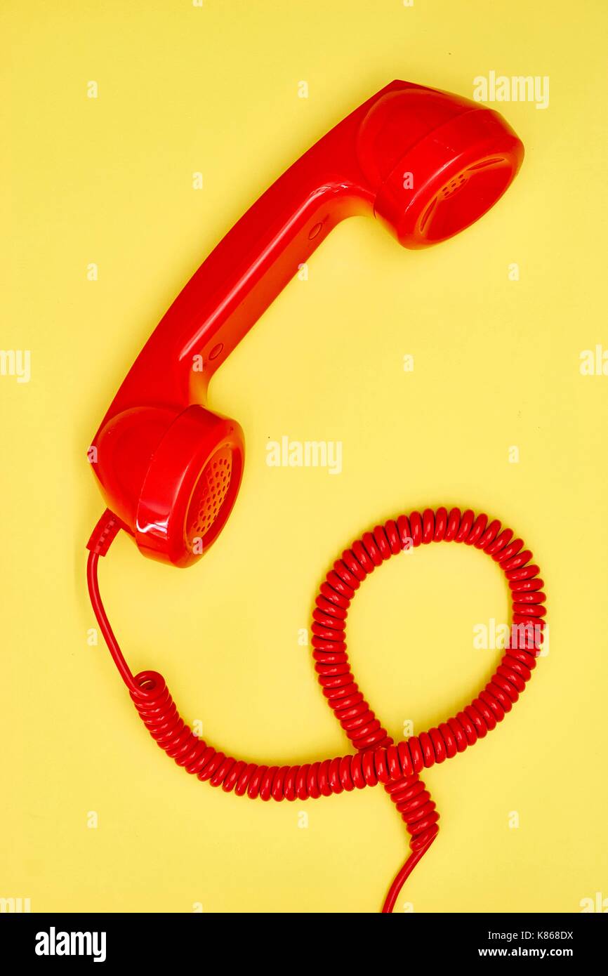 A studio photo of a red rotary telephone Stock Photo - Alamy