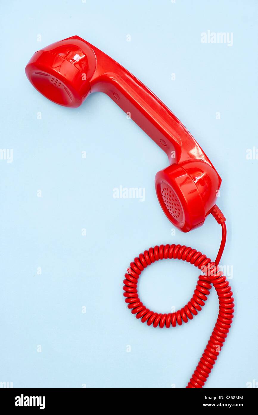 A studio photo of a red rotary telephone Stock Photo - Alamy