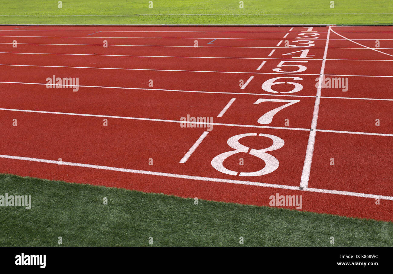field run in stadium Red running with lanes over sky Stock Photo - Alamy