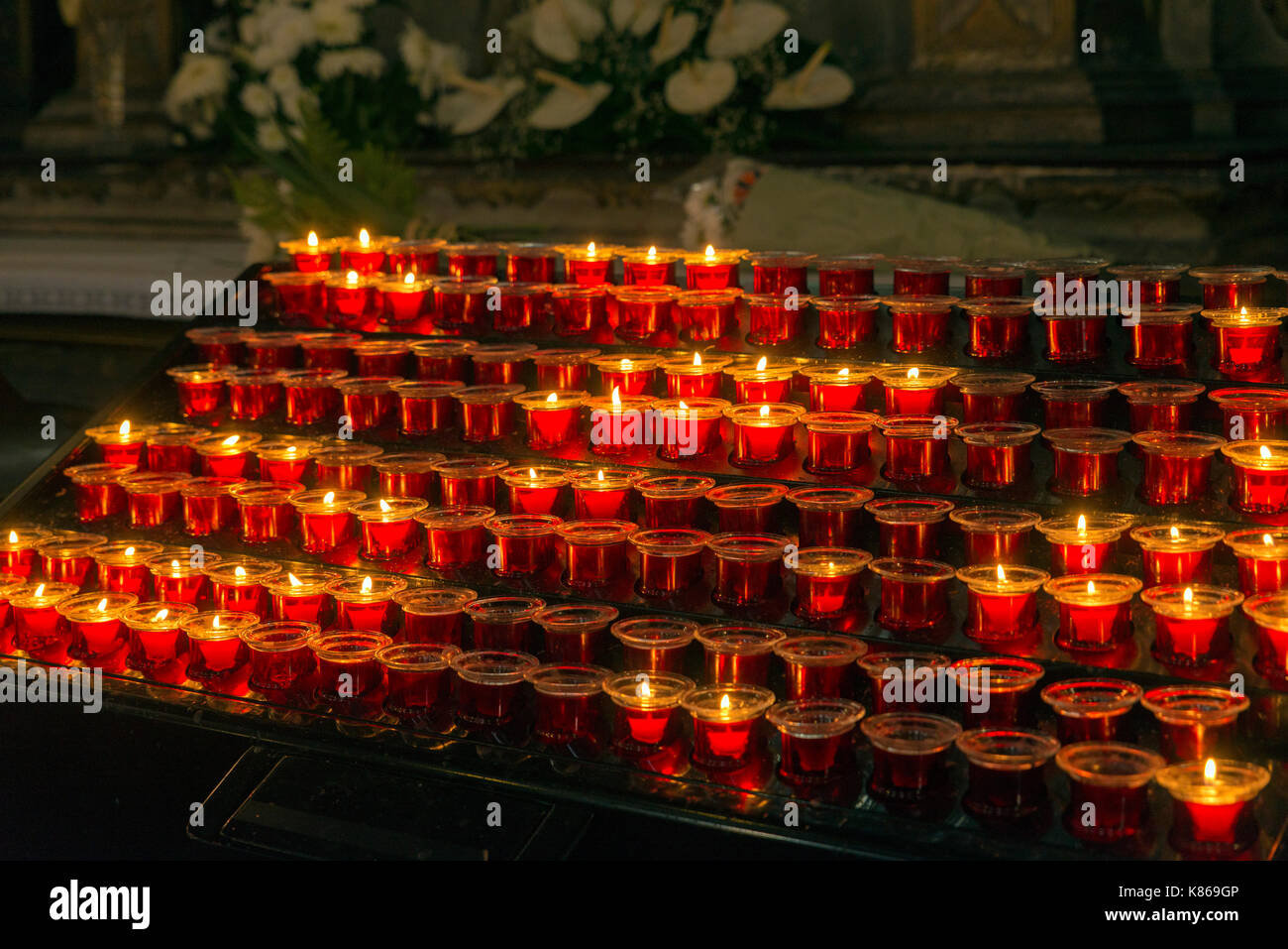 many candles lit Stock Photo - Alamy
