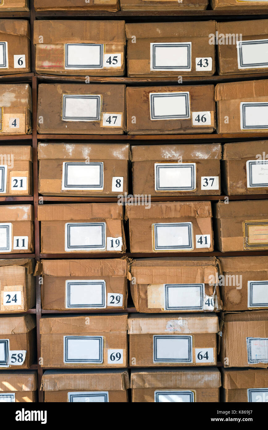 old cardboard boxes fill shelves Stock Photo - Alamy