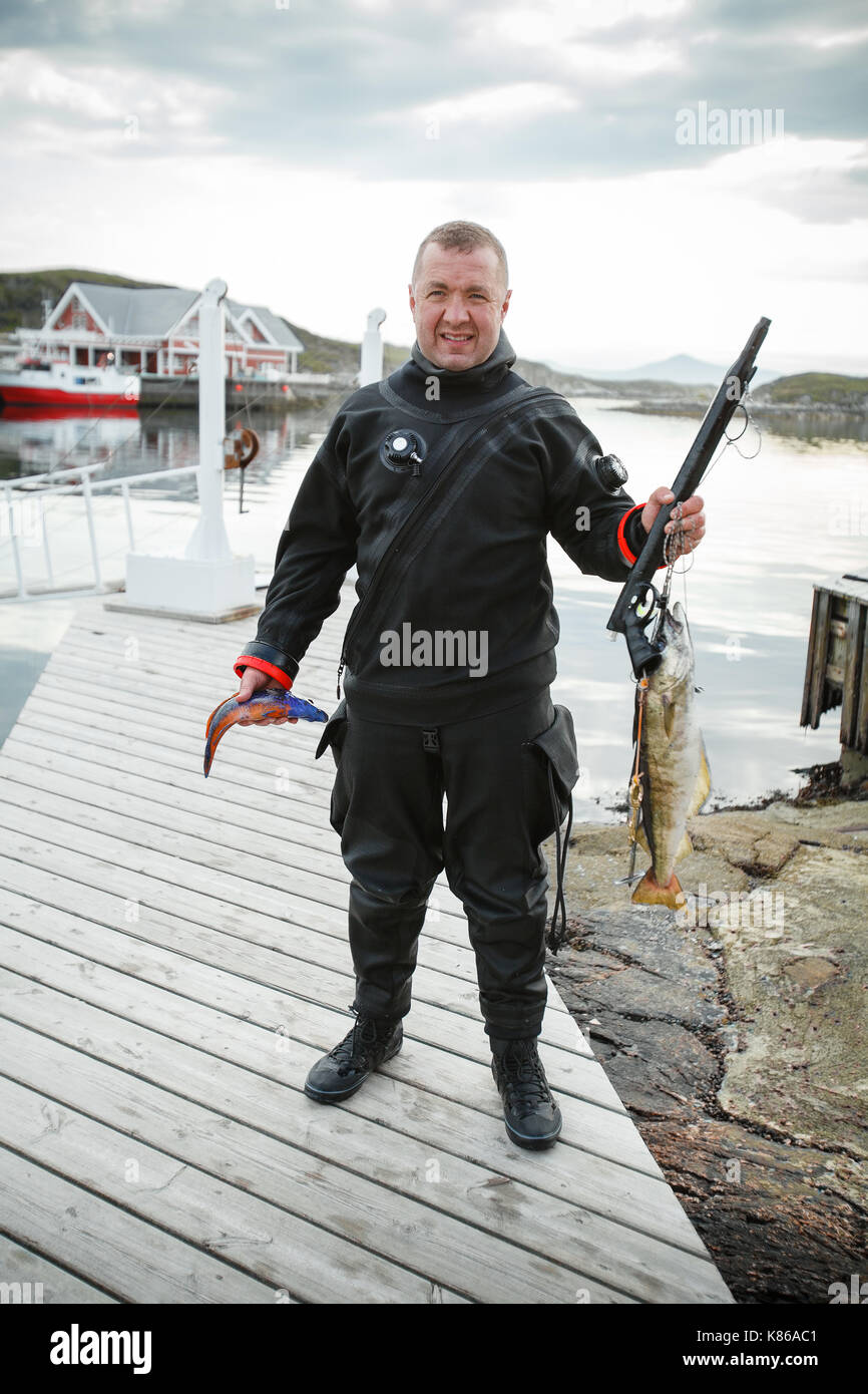 diver with Norwegian fish Stock Photo - Alamy