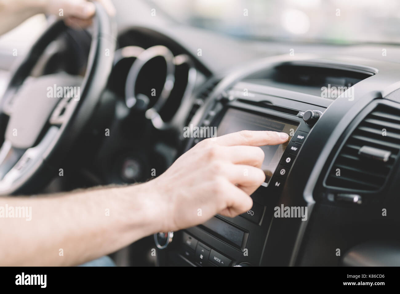 Man Using Gps Navigation System In Car to travel Stock Photo - Alamy