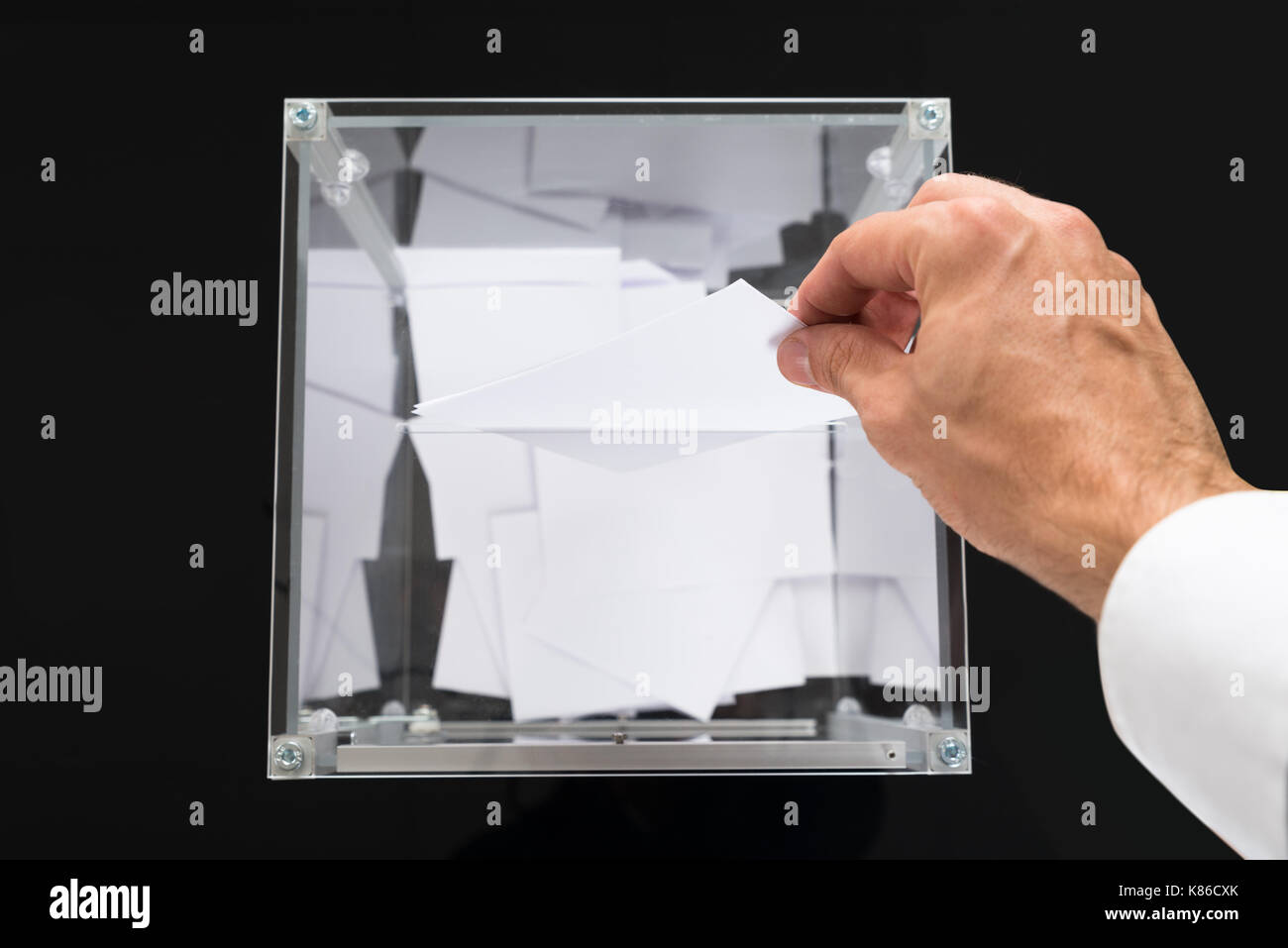 Voting hands ballot box hi-res stock photography and images - Alamy