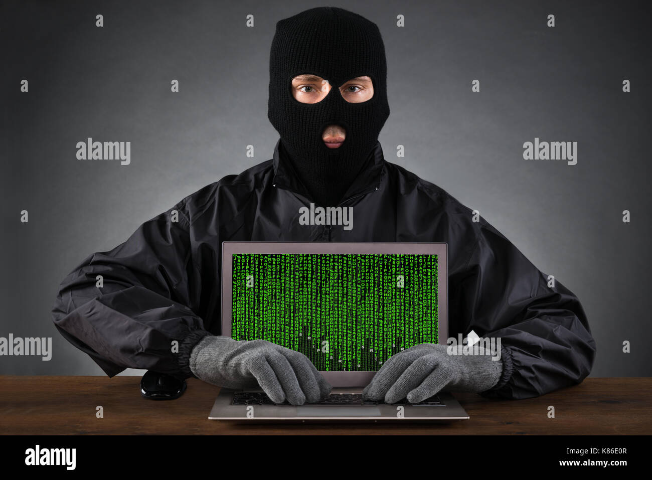 Black glove typing hi-res stock photography and images - Alamy