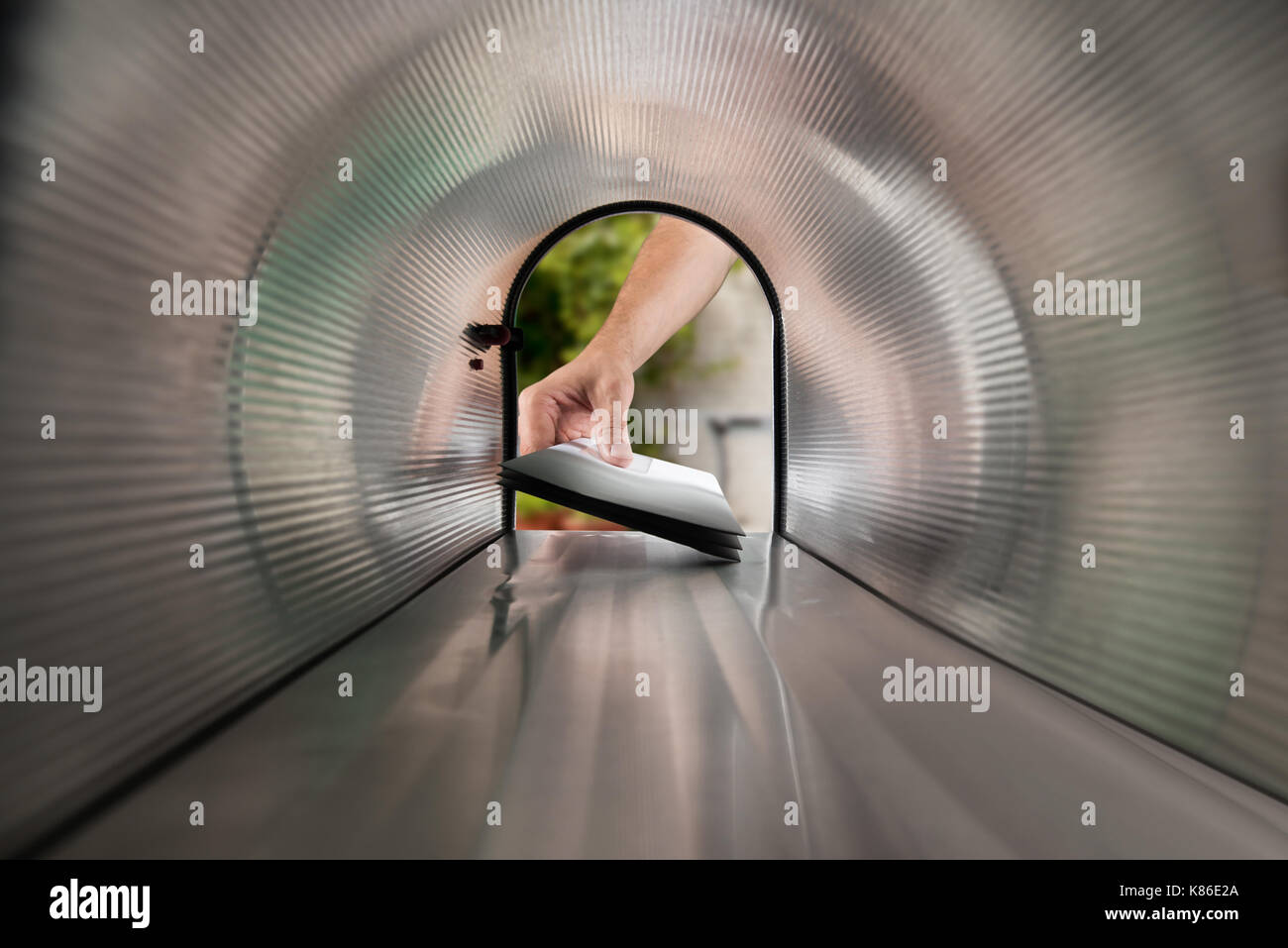 Hand close up opening letters hi-res stock photography and images - Alamy
