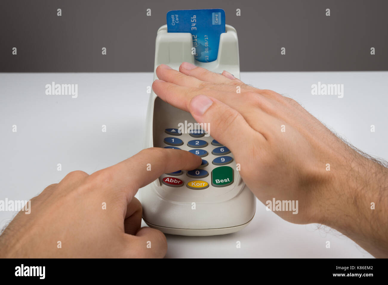 Close-up Of Person Hands Entering Code In A Card Reader Machine Stock ...