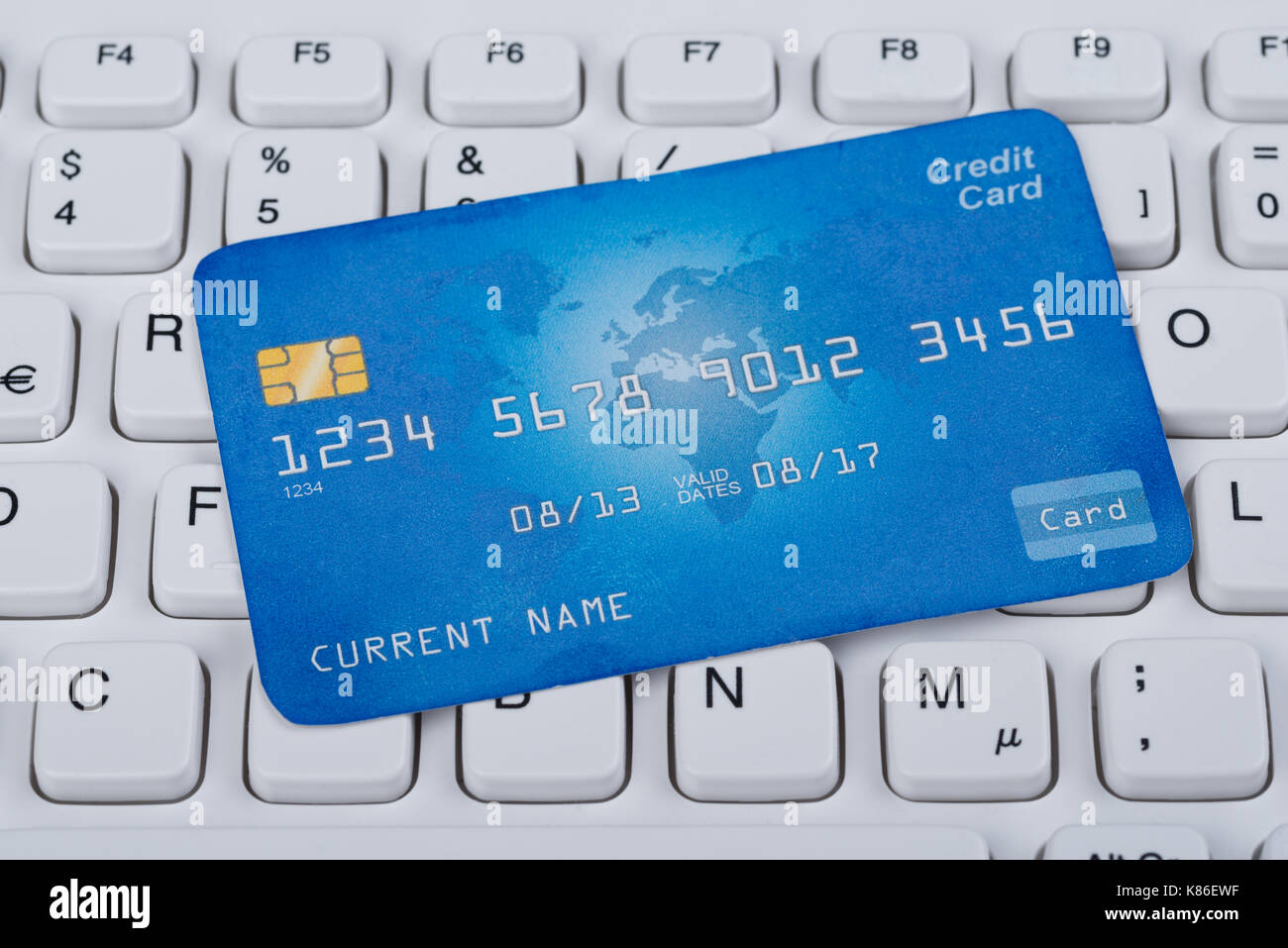 Close-up Of Credit Card Over Keys Of Computer Keyboard Stock Photo - Alamy