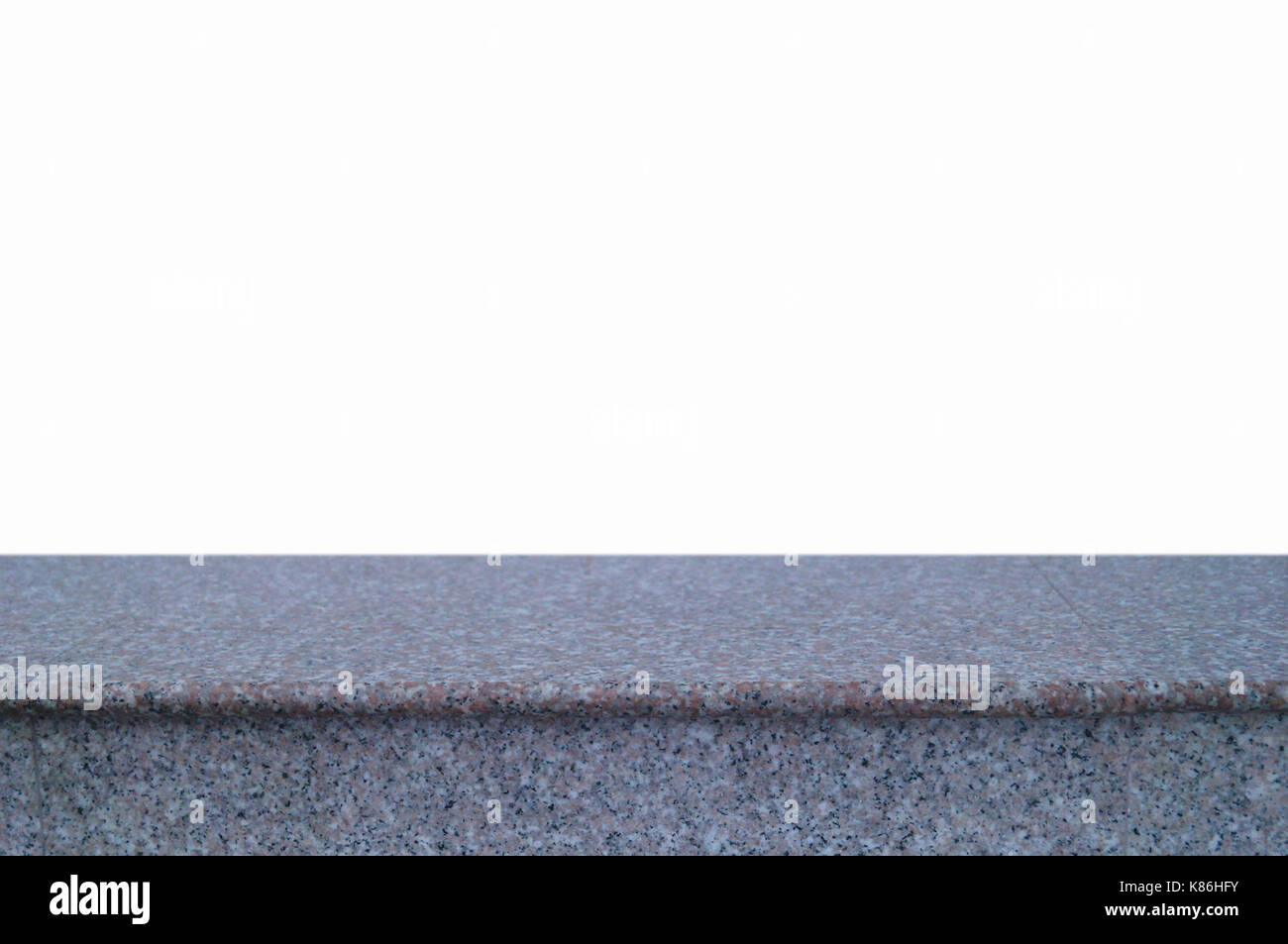 Empty top of granite stone table isolated on white background. For ...