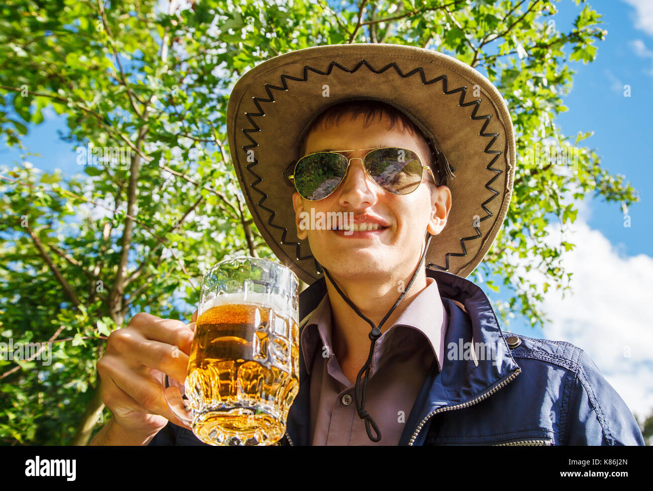 Cowboy drinking beer hi-res stock photography and images - Alamy