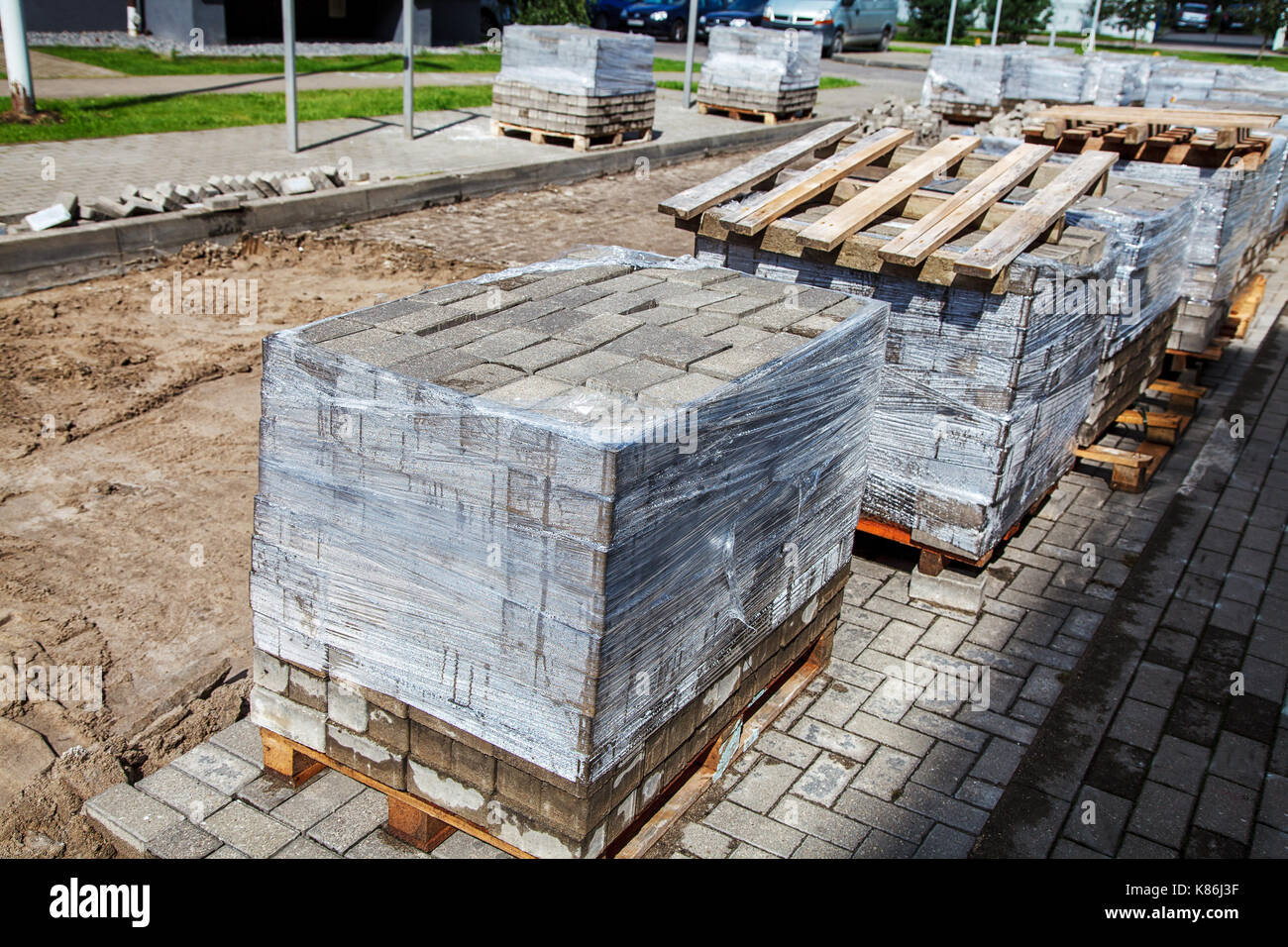 construction of a new modern road with paving slabs in the city on ...