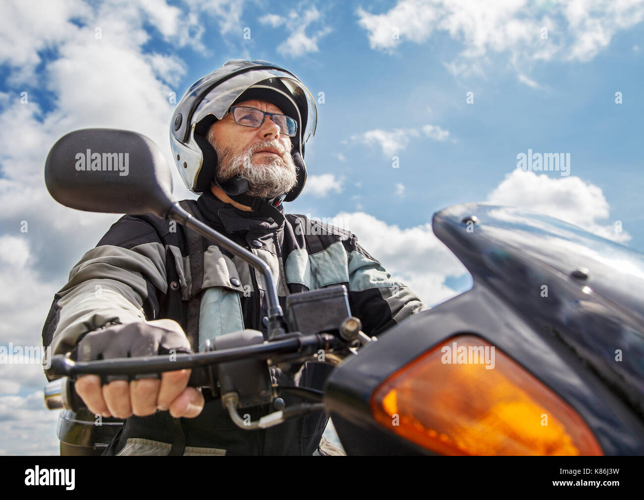 Elderly man sitting on motorcycle High Resolution Stock Photography and ...