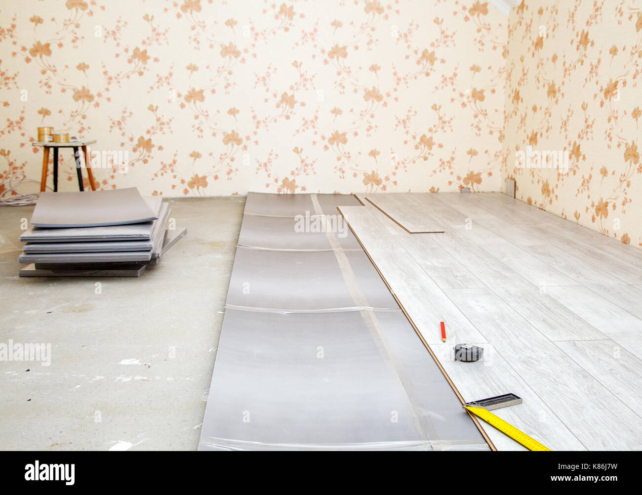 laminate boards prepared for laying on the floor in the room Stock ...