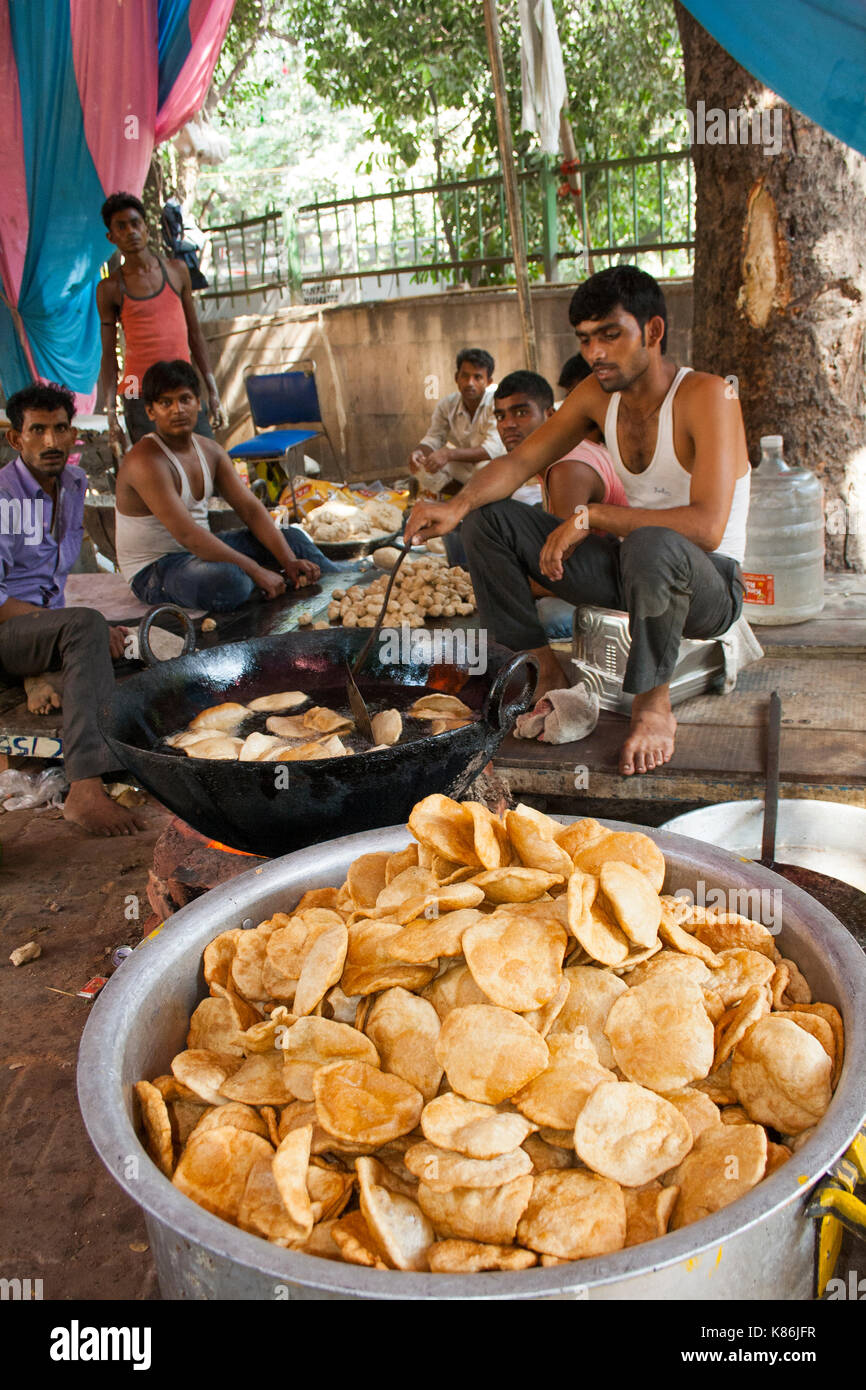 people frying puri bread,street food, durga puja Stock Photo - Alamy