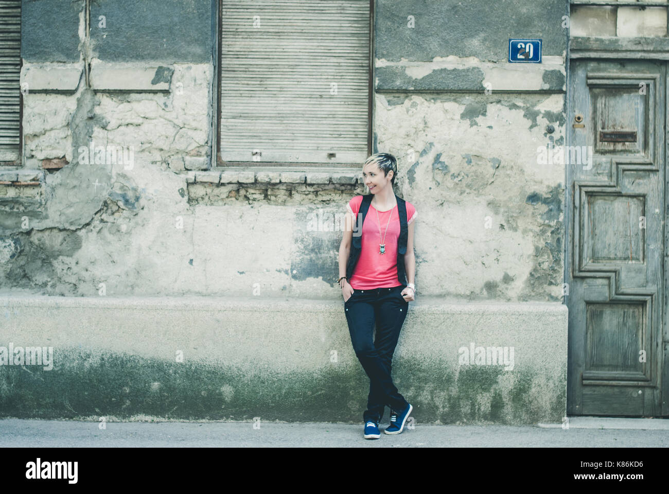 Sad blond girl in white dress hi-res stock photography and images - Alamy
