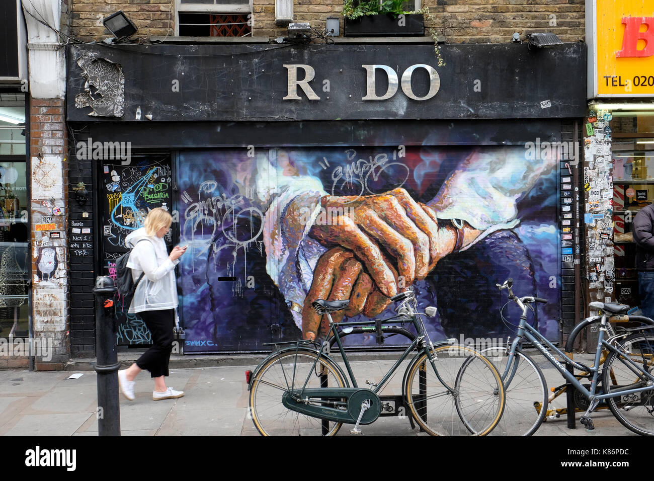 Shop front covered by graffiti hi-res stock photography and images - Alamy