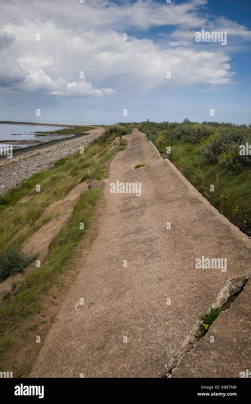 Section of road at Spurn point damaged by storm surge, Humberside ...