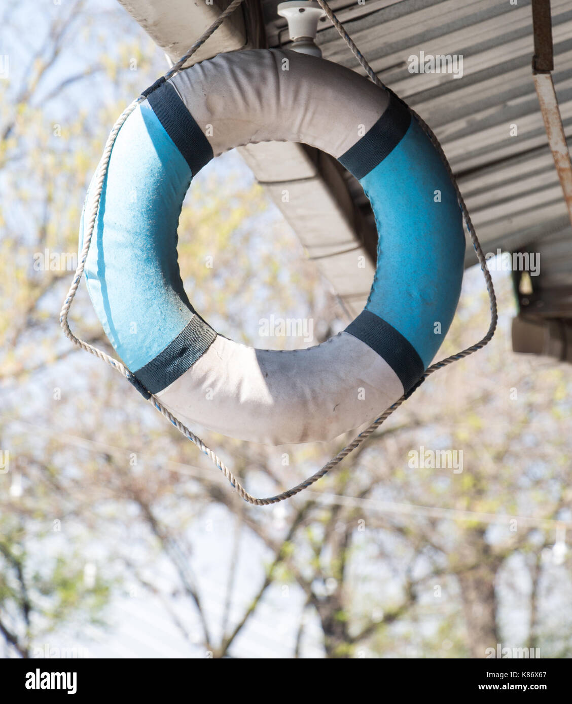 Life preserver or life saver hanging in air Stock Photo - Alamy