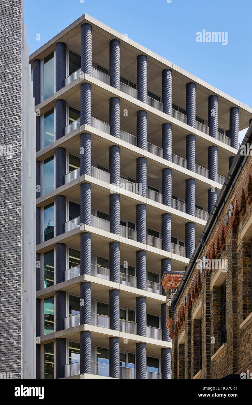 View between buildings of the Iron columns of One Pancras Square, David ...