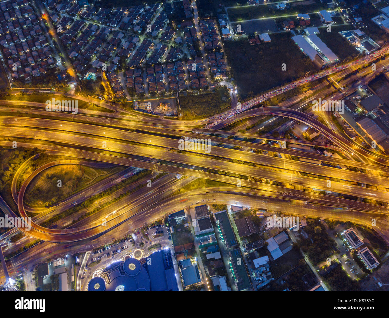 Aerial view of expressway and motorway at night shot by drone in ...