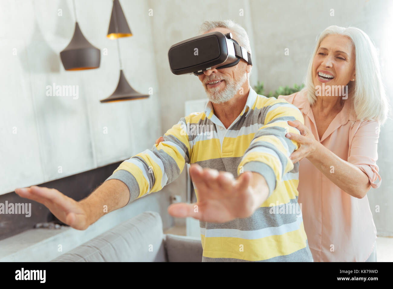Positive loving aged couple testing VR glasses Stock Photo - Alamy Positive loving aged couple testing VR glasses Stock Photo - Alamy