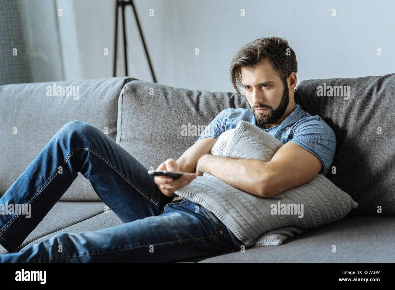 Man Holding A Remote Control High Resolution Stock Photography and ...