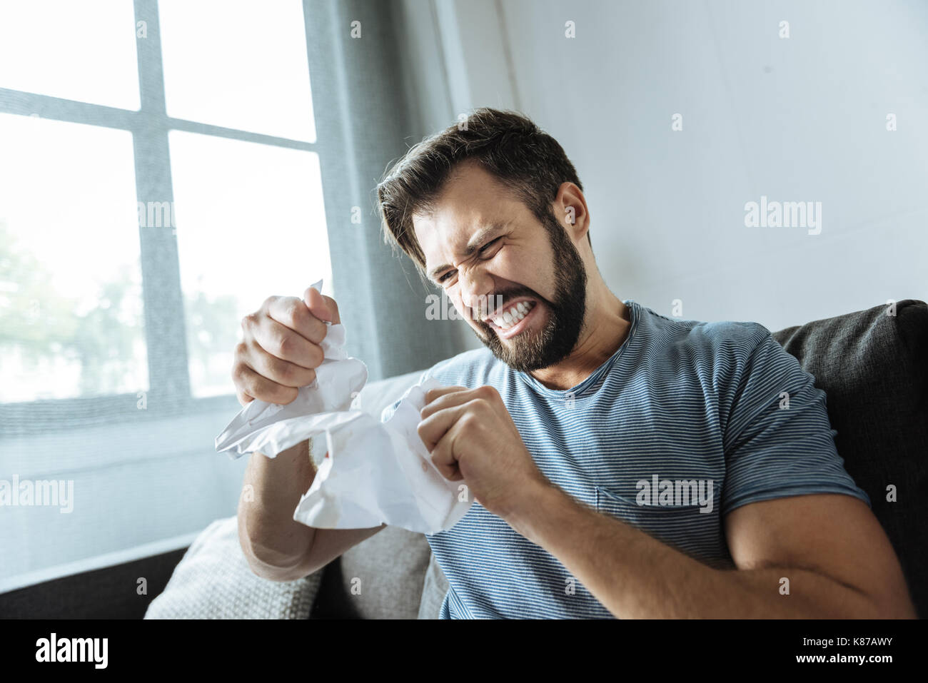 Tearing paper hi-res stock photography and images - Alamy