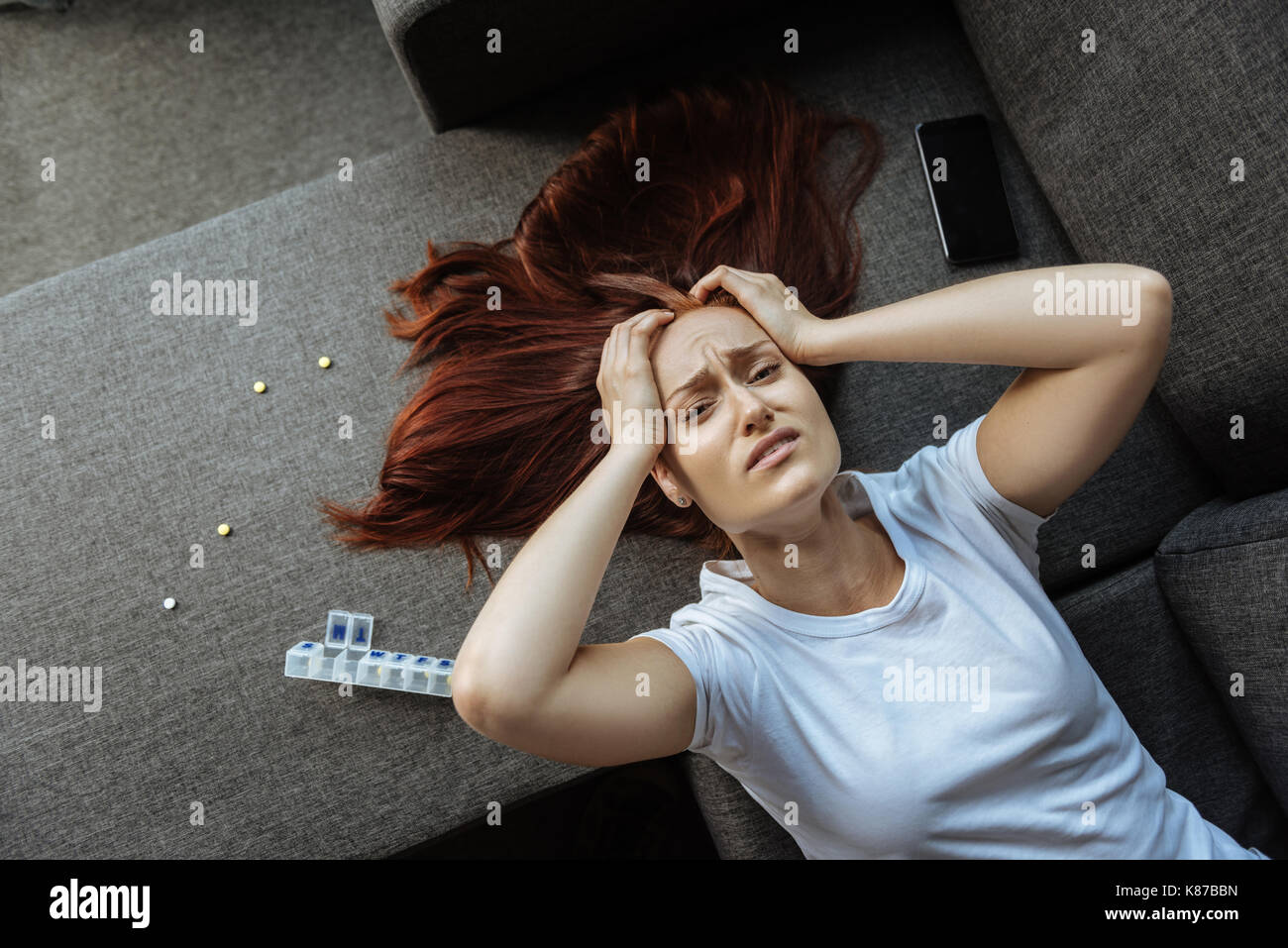 Cheerless upset woman suffering hi-res stock photography and images - Alamy